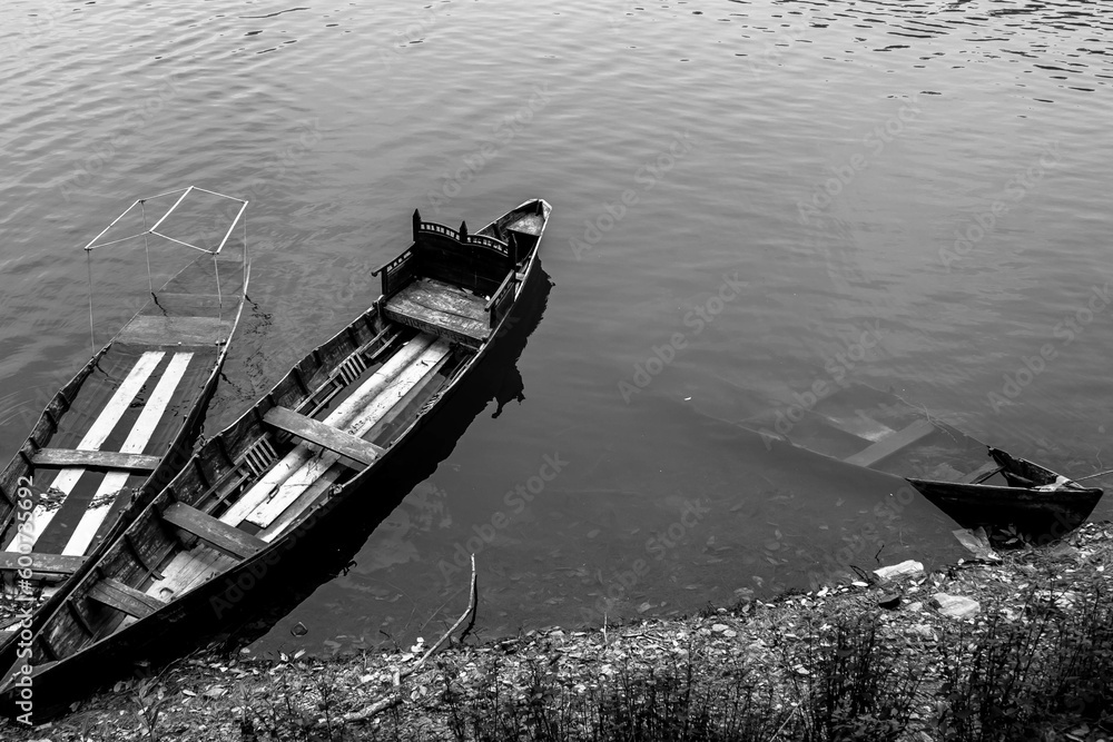 Submerged Boats Stock Photo | Adobe Stock