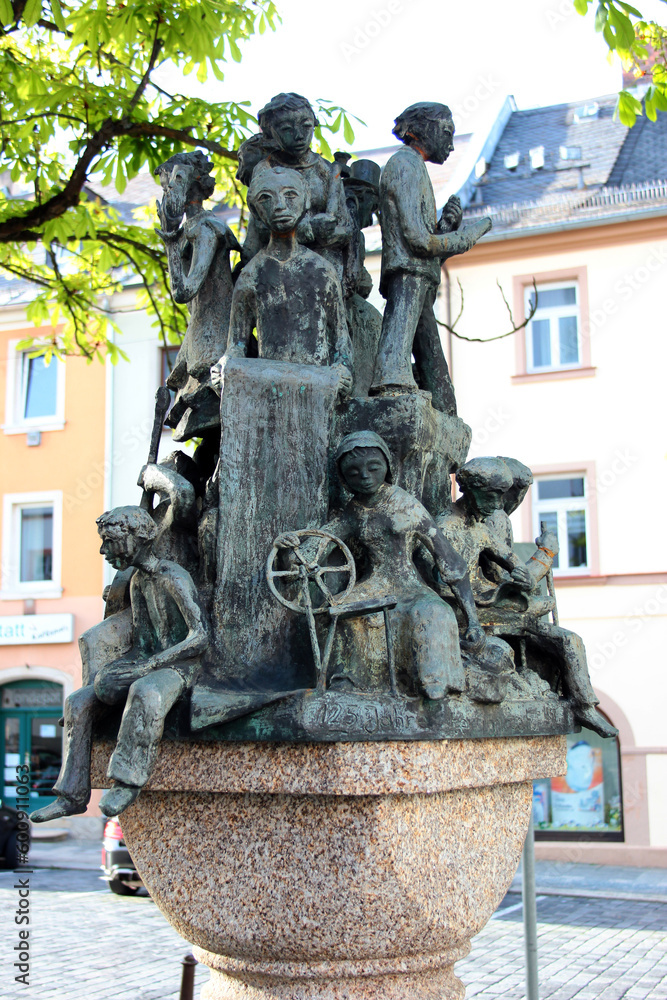 Hof, Germany - May 9, 2023: Sculpture in the fountain near the townhall ...