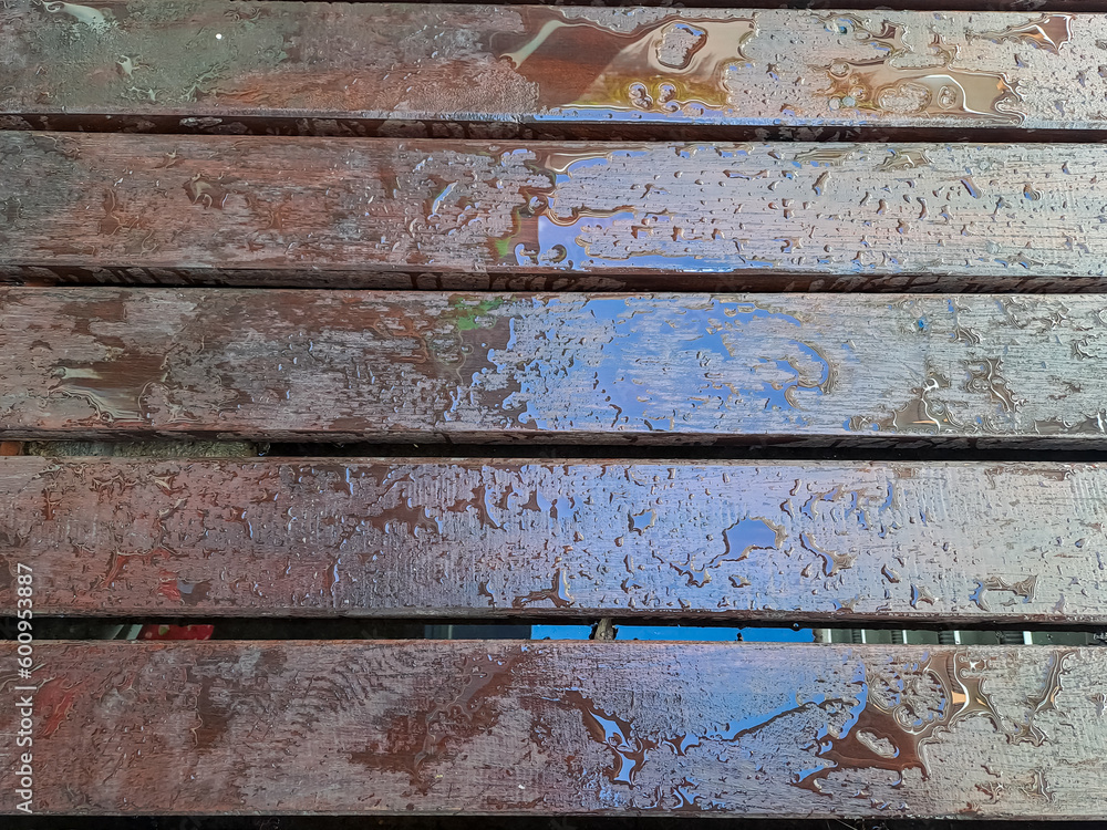 Wet wooden deck or wooden floor of pool side arranged horizontally ...