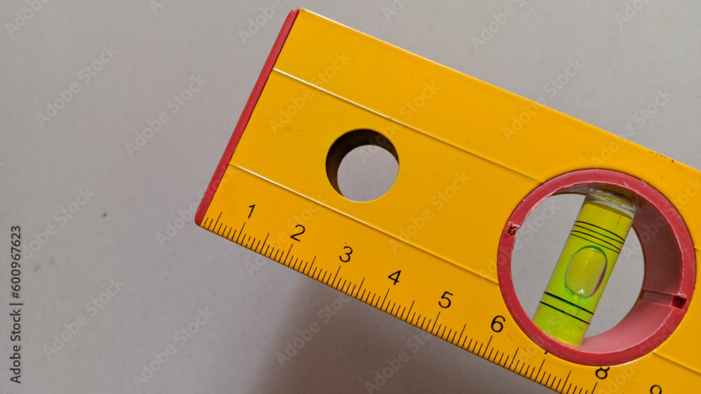 Ruler and water level meter. Used to measure the difference in height ...