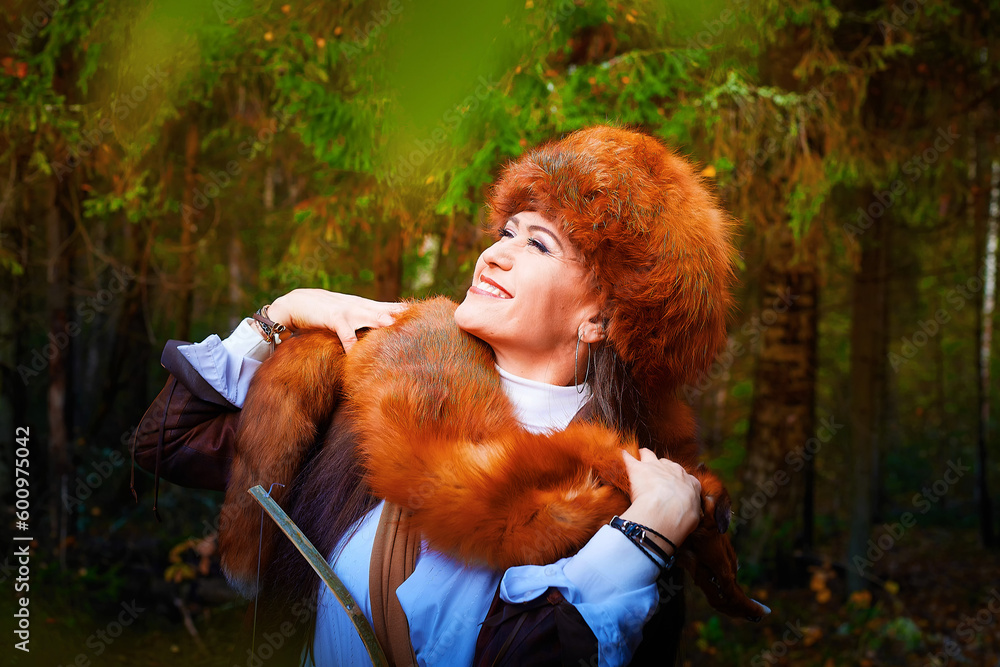 Girl in a leather jacket, a big red fox fur hat and with the skin of a ...