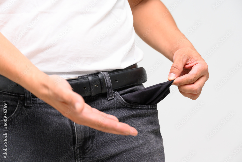 Black jean man turning his empty pockets inside out isolated on white ...