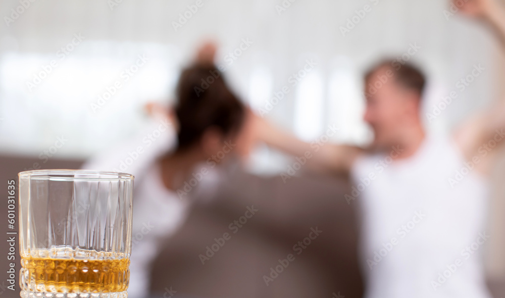 Alcohol addiction and family problems. Sad middle-aged woman looking ...