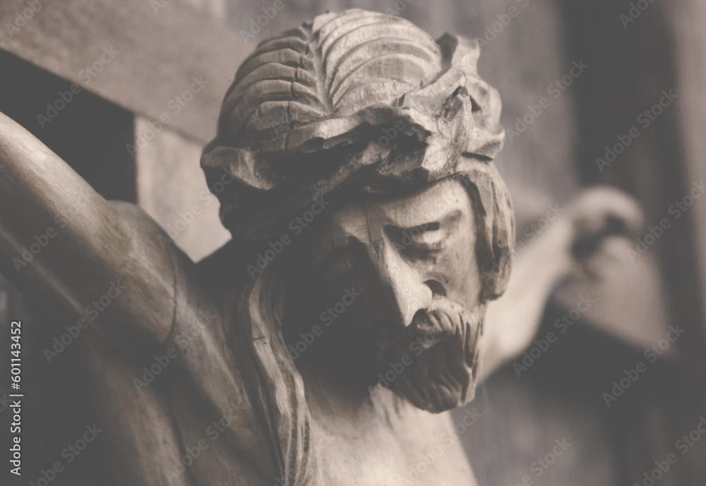 Holy cross with crucified Jesus Christ (Close up an ancient wooden statue) Stock Photo | Adobe Stock
