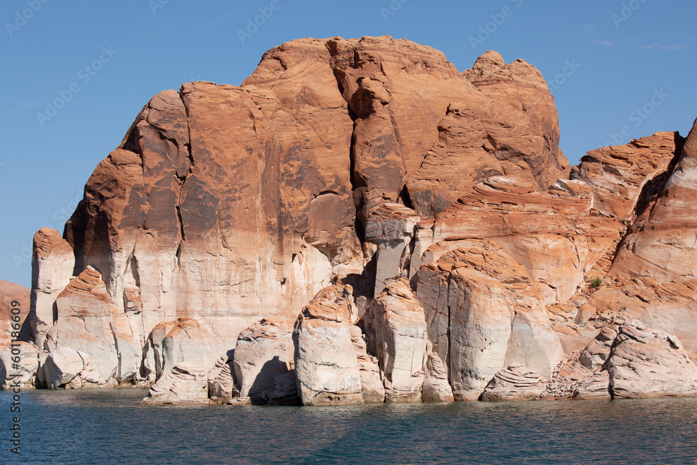 red rock texture with cracks, skies, water, background with space for ...