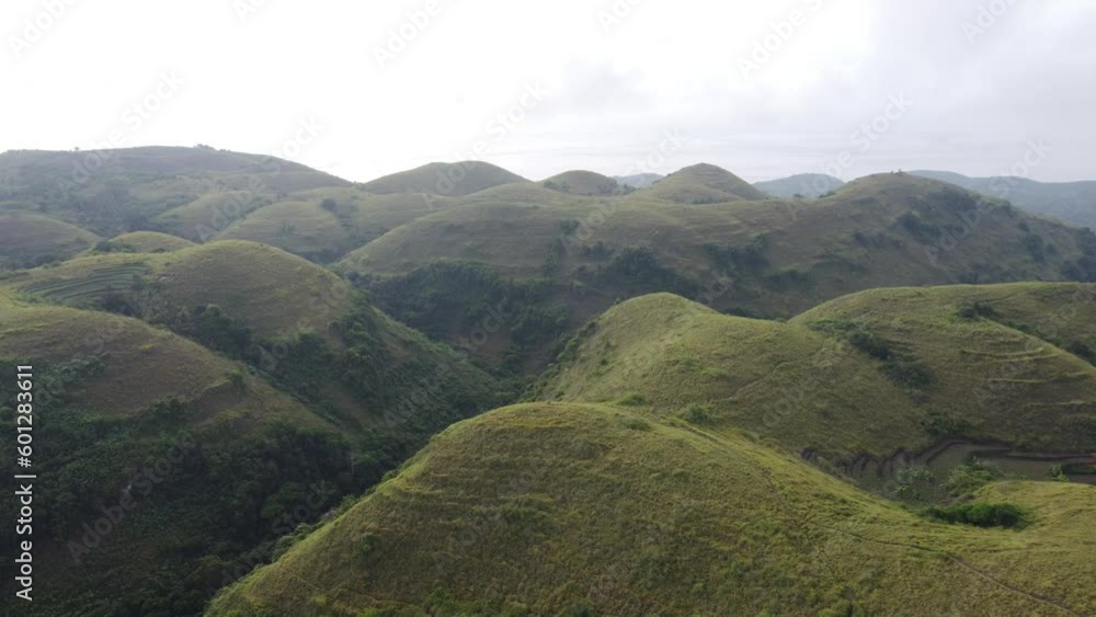 Aerial view, bizzare looking big rolling Teletubbies Hills in Nusa ...