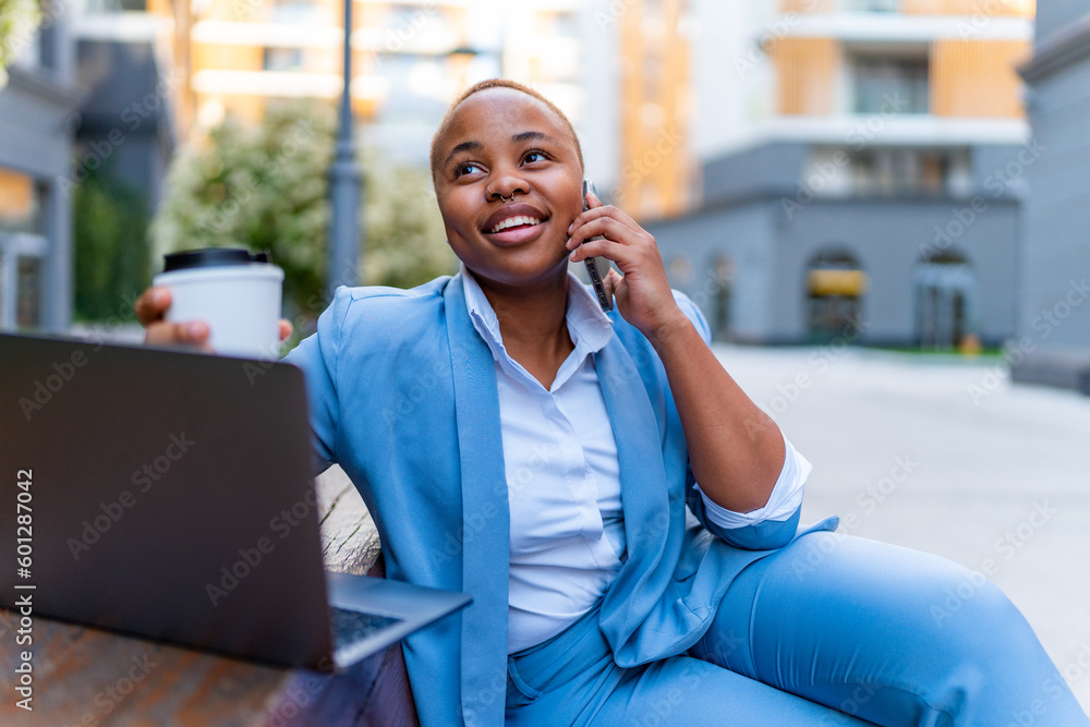 Young scientist woman drinking coffee in front of her research center ...
