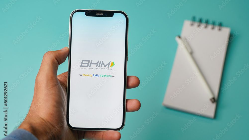 BHIM UPI mobile phone app on colour background: Kolkata, West Bengal ...