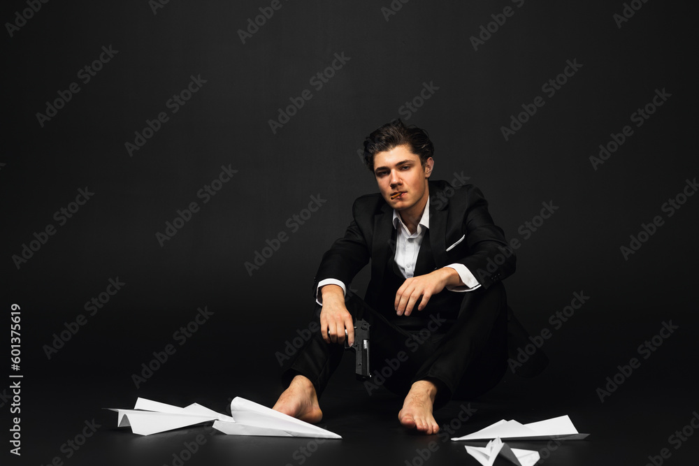 Sitting on the floor Young mafia member with a slicked back hair, in ...