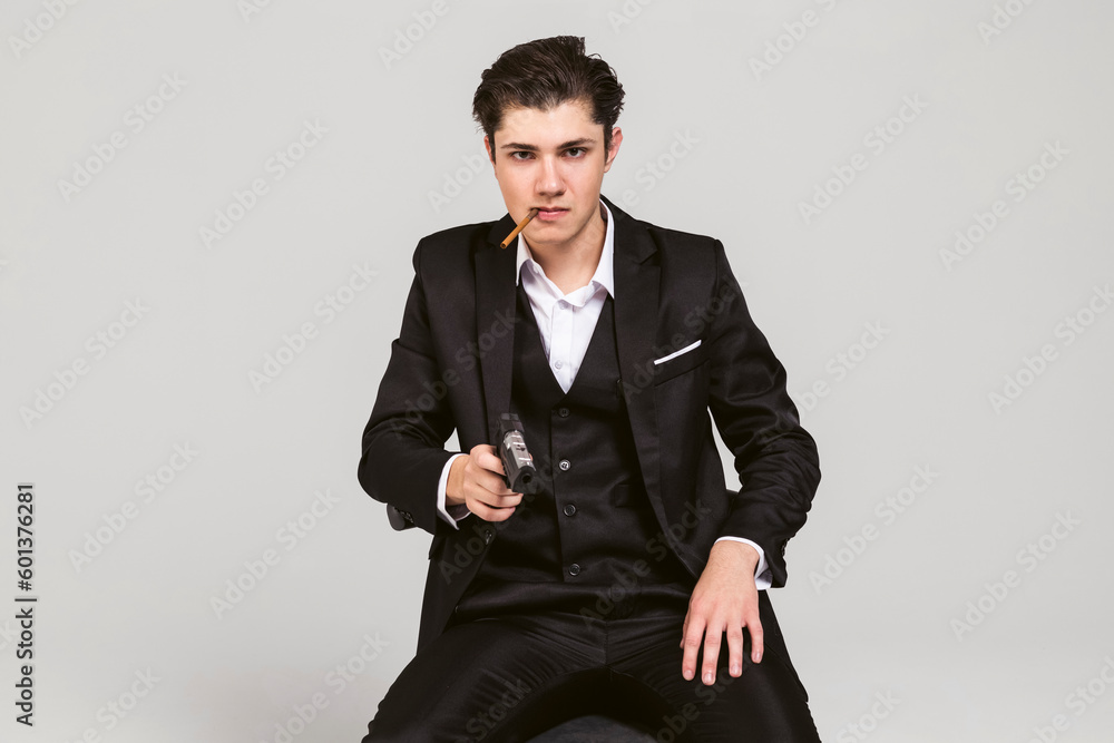 Important, authoritative Young mafia member with a slicked back hair ...