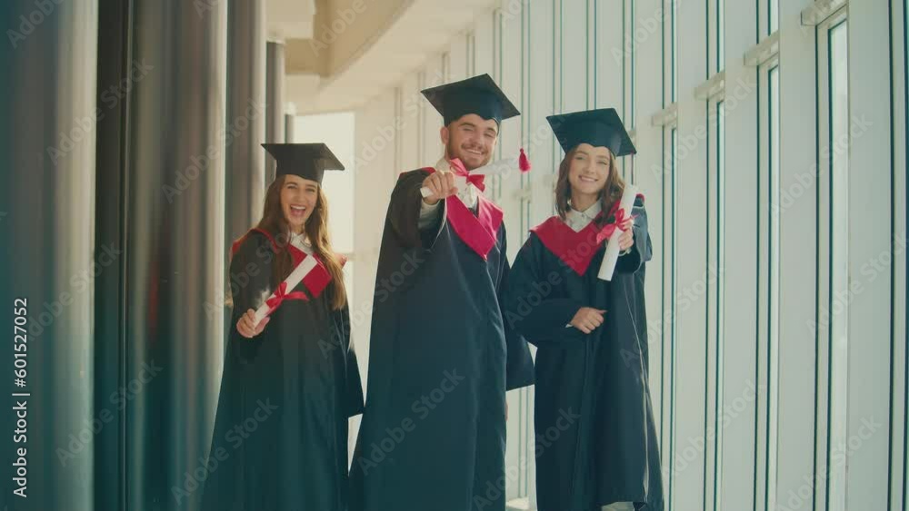 Graduates in the Mantle Happy About Getting a Diploma. Young Students ...