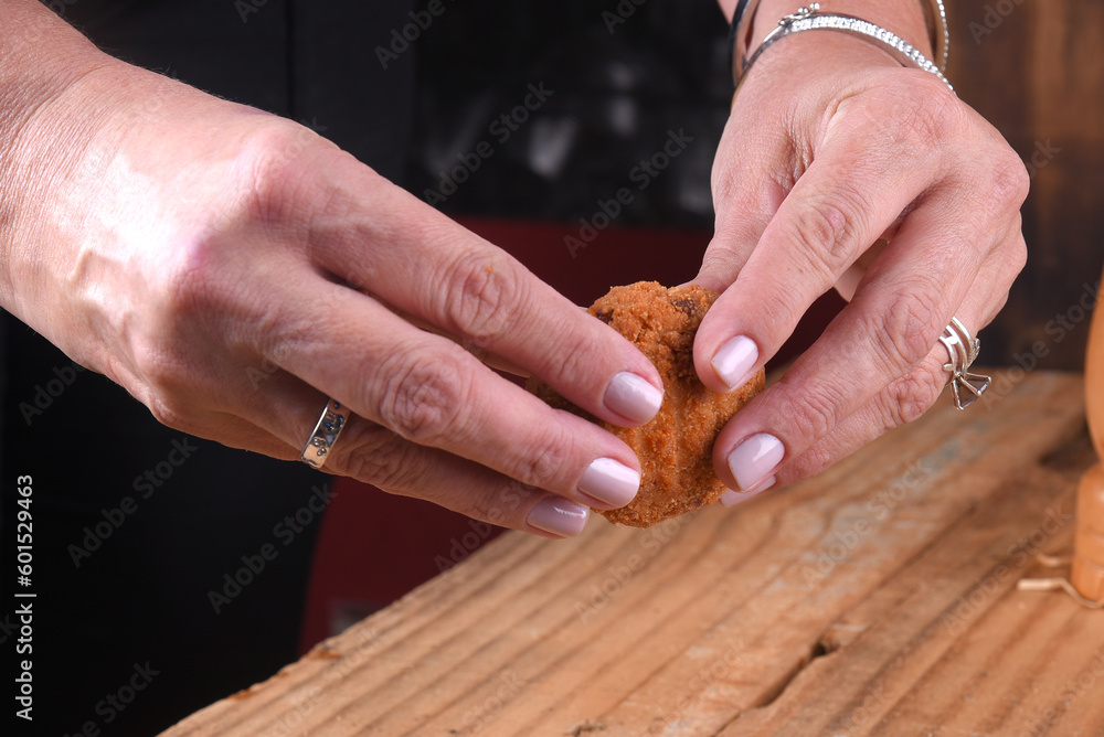 Fried and breaded cod fritters, fish empanadas, cod fritters, Brazilian ...