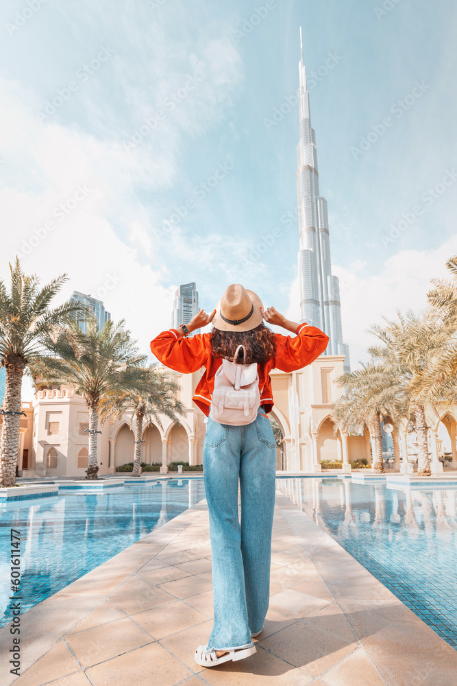 18 January 2023, Dubai, UAE: Rear view of the traveler girl with ...