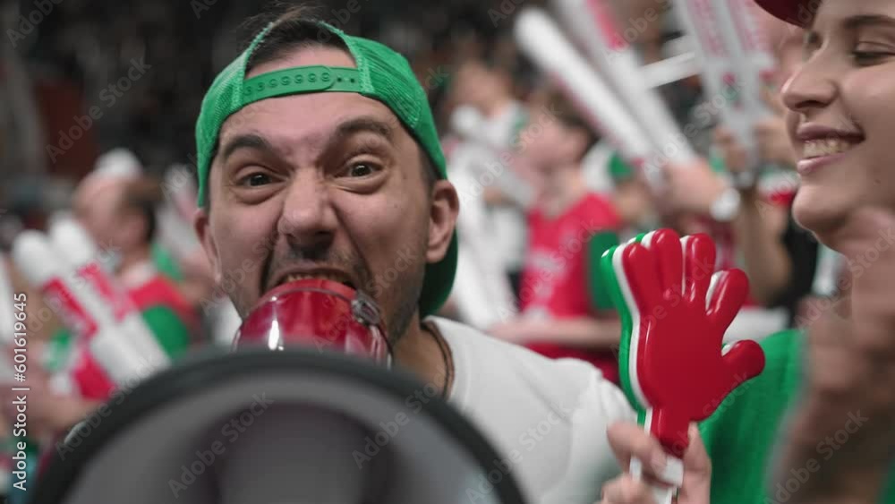 Angry man scream megaphone sport stadium. Crazy mad fan shout bullhorn ...