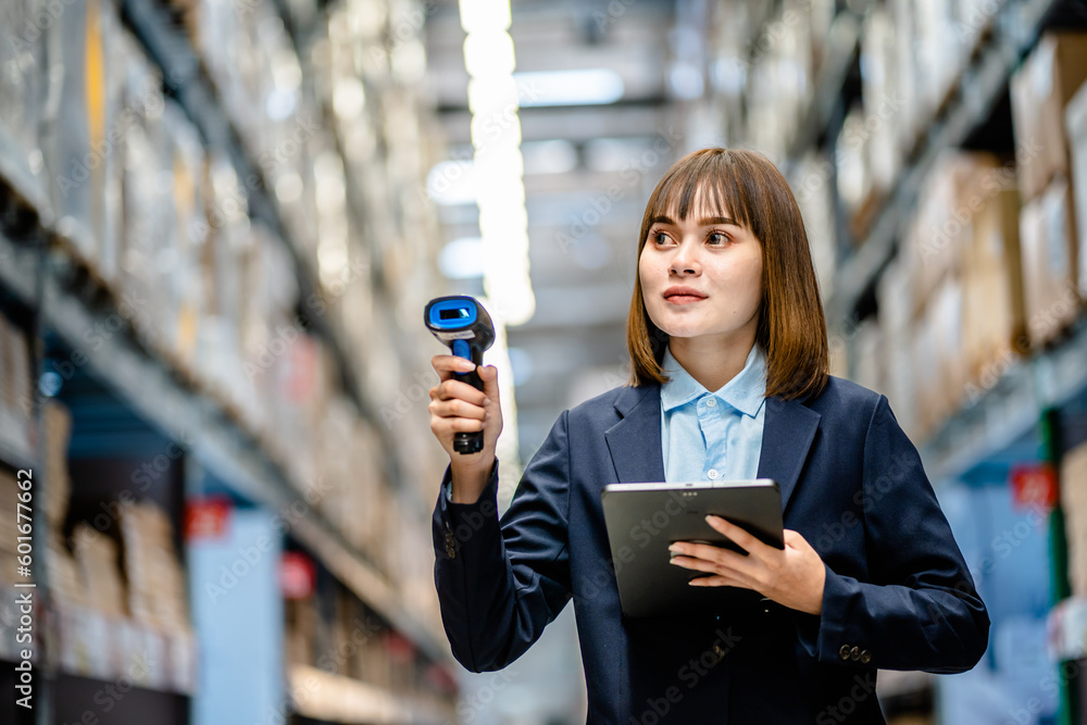 Women managers use scanner checking and scan barcodes of stock ...