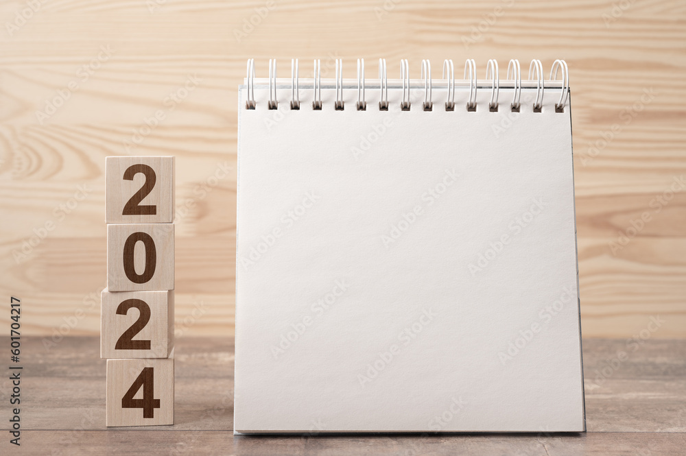 Mockup 2024 calendar. Text 2024 on wooden cubes. space for your text on ...