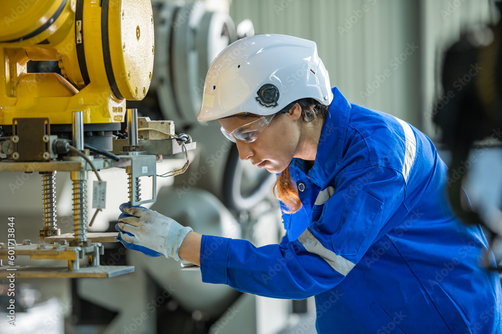 woman technician engineer worker check heavy machine construction ...