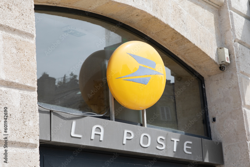la poste building sign logo of French post office and brand text wall ...