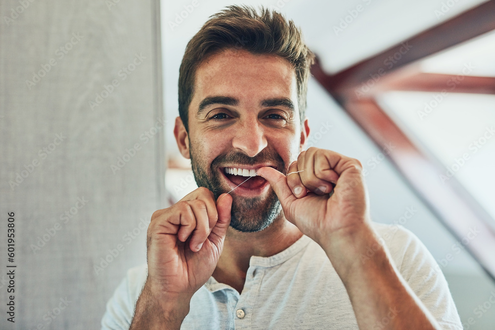 Man Flossing Teeth