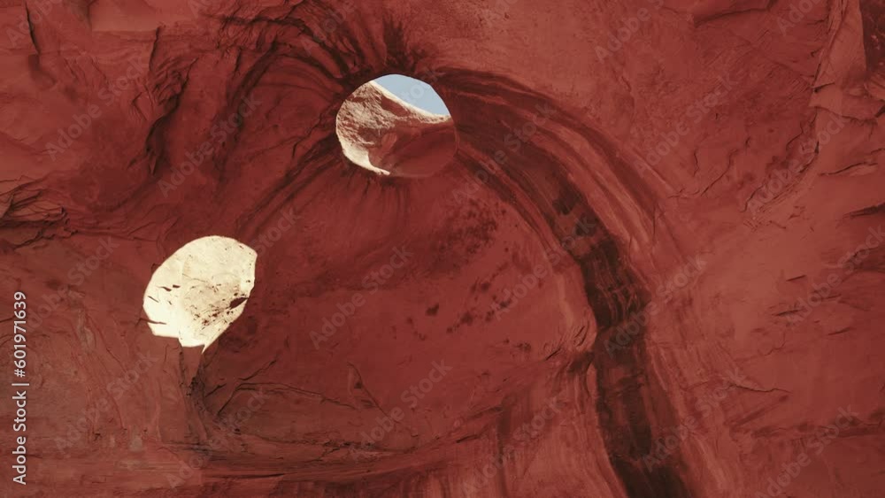 The beauty of cave eyes in the iconic Monument Valley, Utah. Explore ...