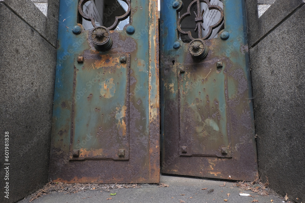 Rust deteriorations. Really old and decrepit door from a century-old ...