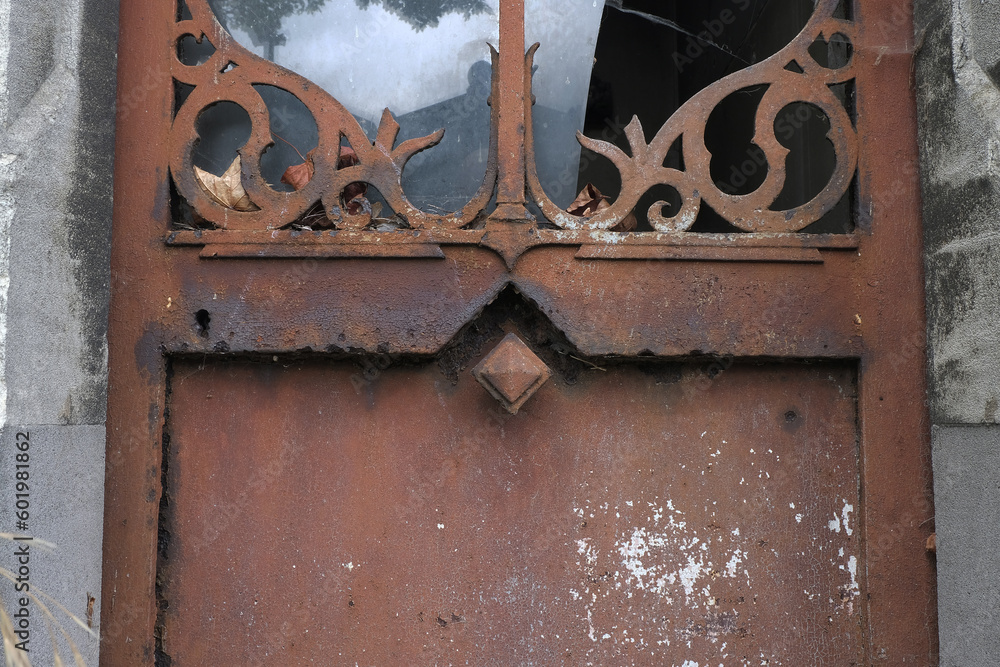 Rust deteriorations. Really old and decrepit door from a century-old ...