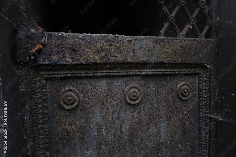 Rust deteriorations. Really old and decrepit door from a century-old ...