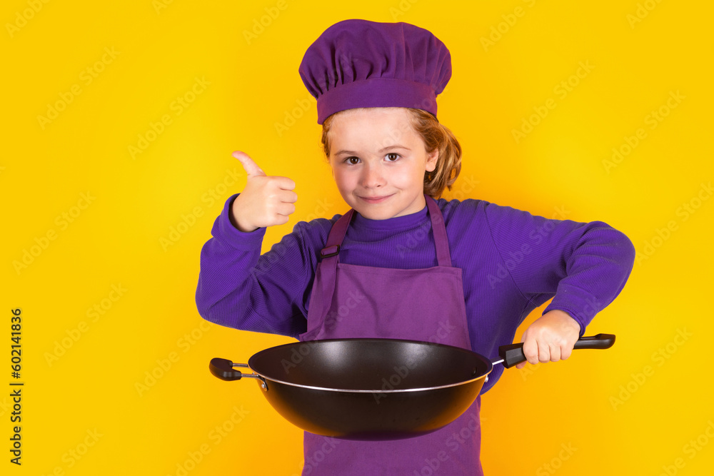Kid boy chef cook with cooking pan. Child chef cook. Child wearing ...
