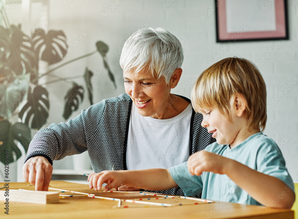 grandchild family child grandparent grandmother game playing boy stick ...