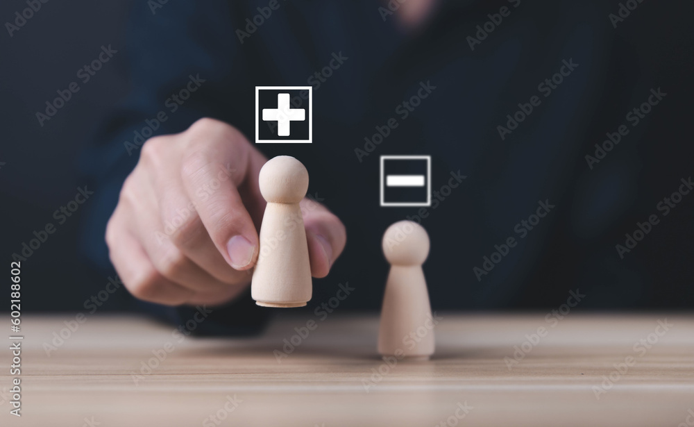 Block people show plus and minus symbols. The concept of opposites ...