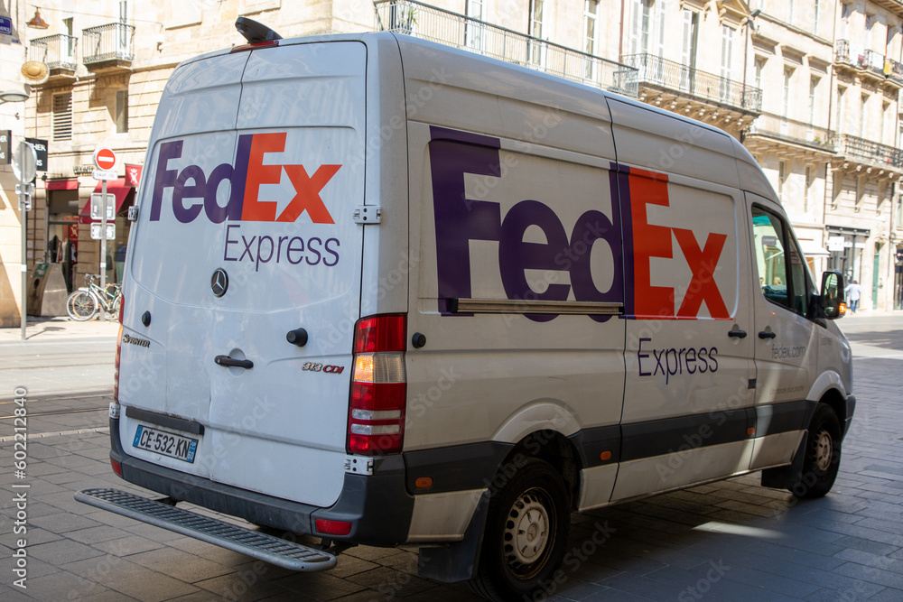 Fedex express logo brand mercedes and sign text on panel delivery van ...
