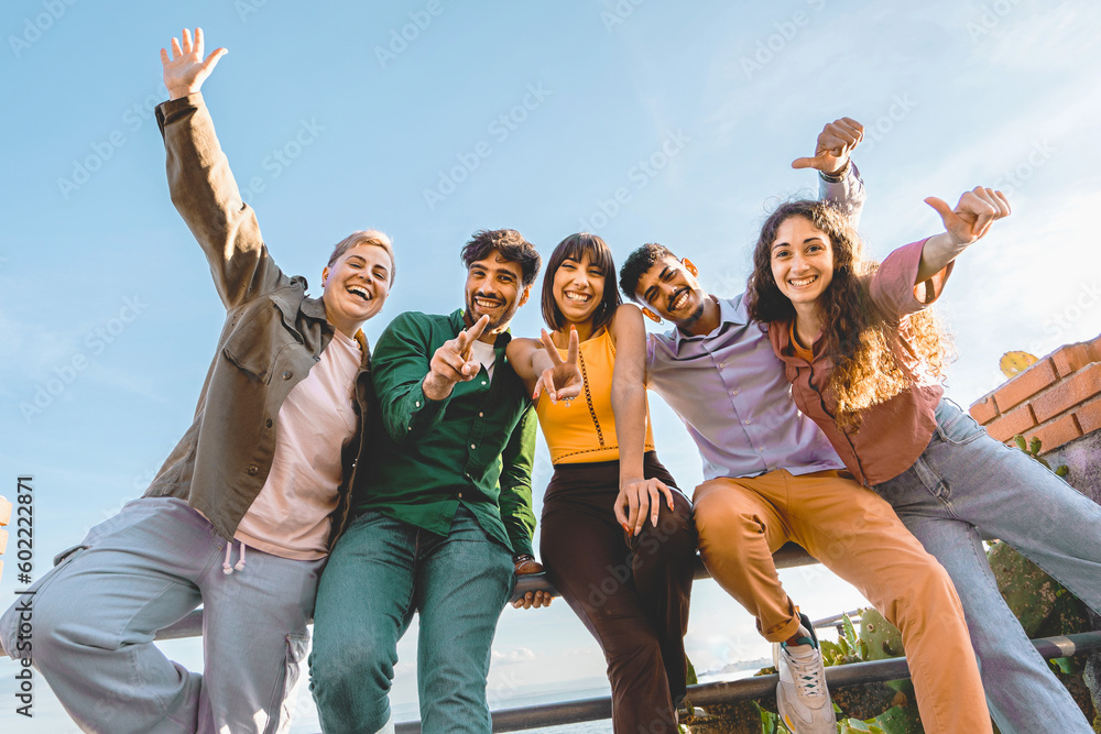 Multiracial Group of Friends Celebrating Together - Five friends by the ...