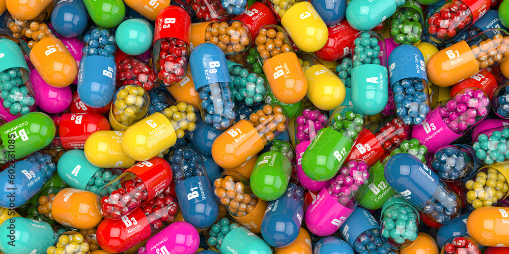 Pile of various vitamin capsules. Dietary and nutritional supplemets ...