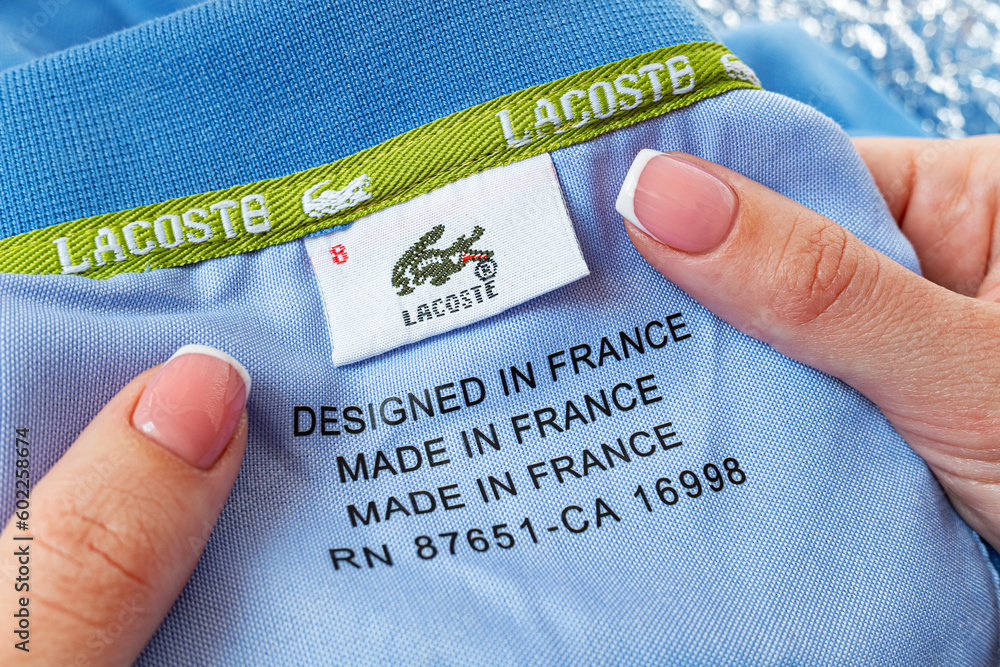 Kyiv, Ukraine- 14 May 2023: Clothes "Lacoste" label showing garment was ...