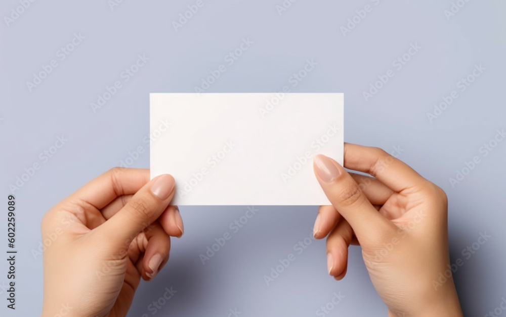 A female hand gripping a white piece of paper with areas for messages ...