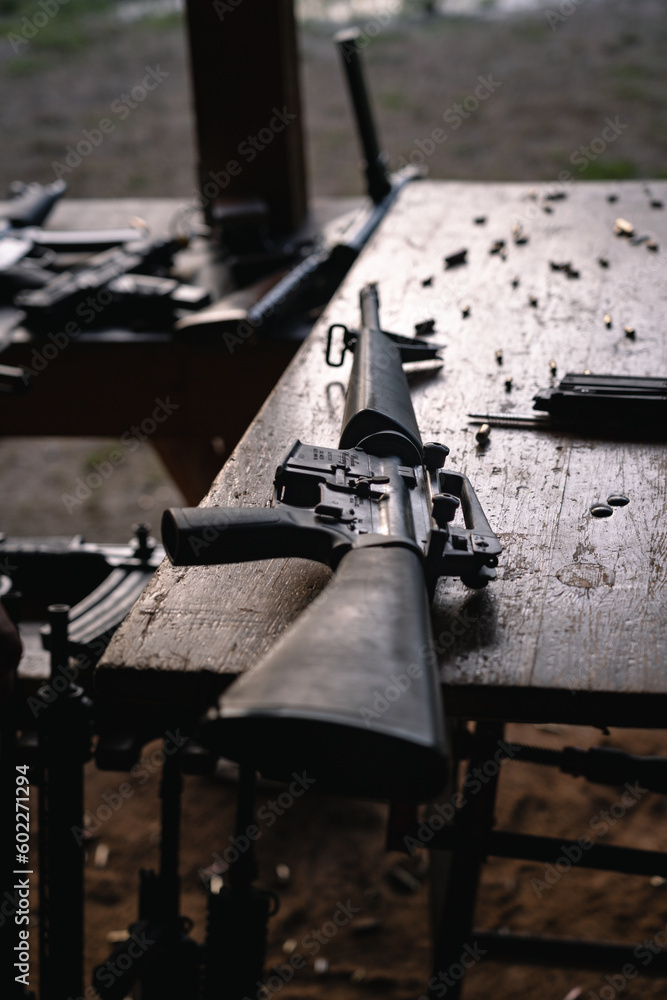 Training shooting weapons at an outdoor shooting range. Stock Photo ...