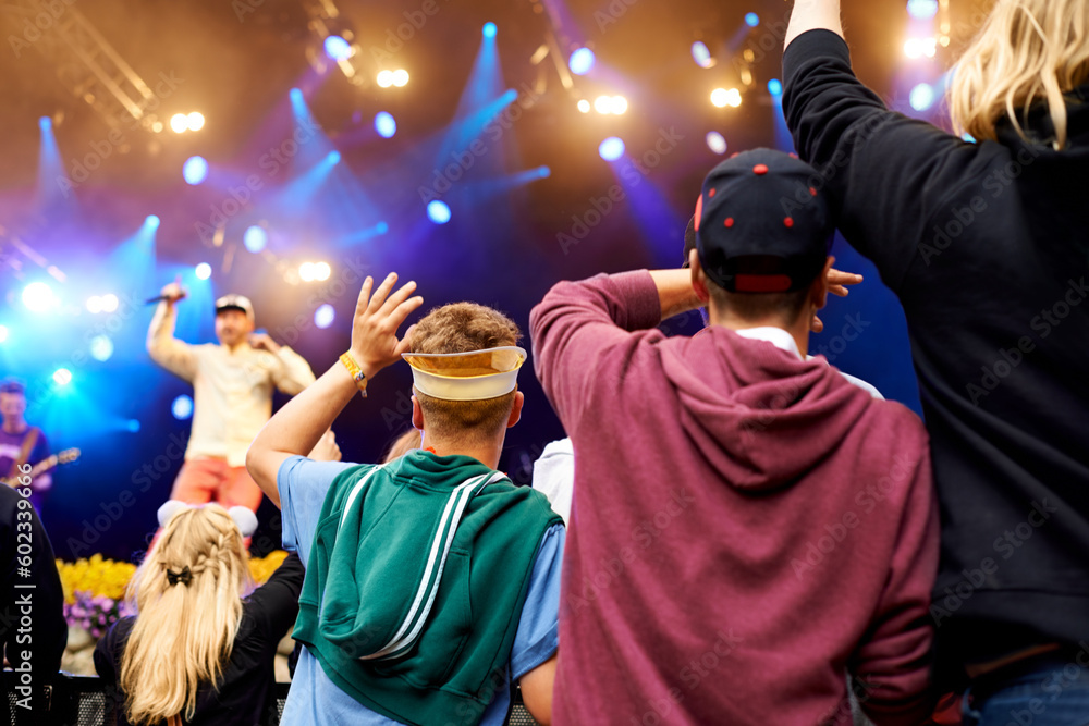 Music, dance and party with people at festival for celebration, rave ...