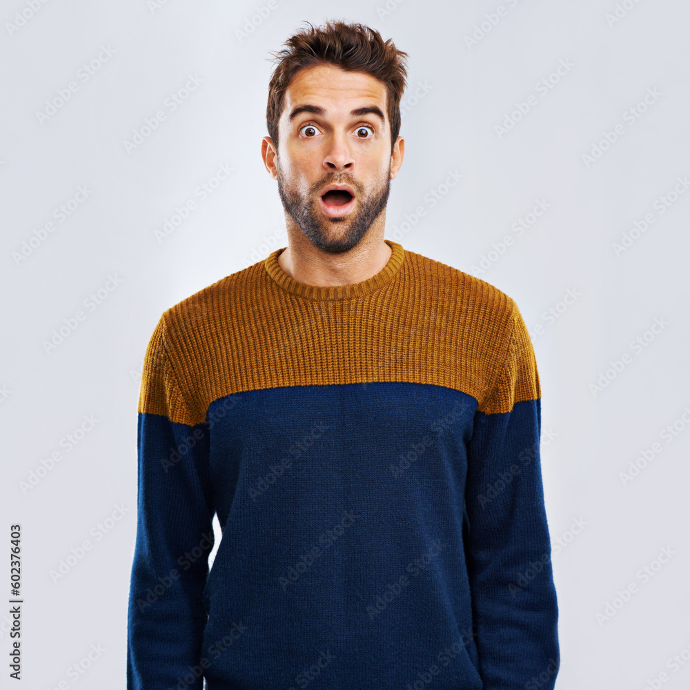 Shock, portrait and male model in a studio with an amazed or surprise ...