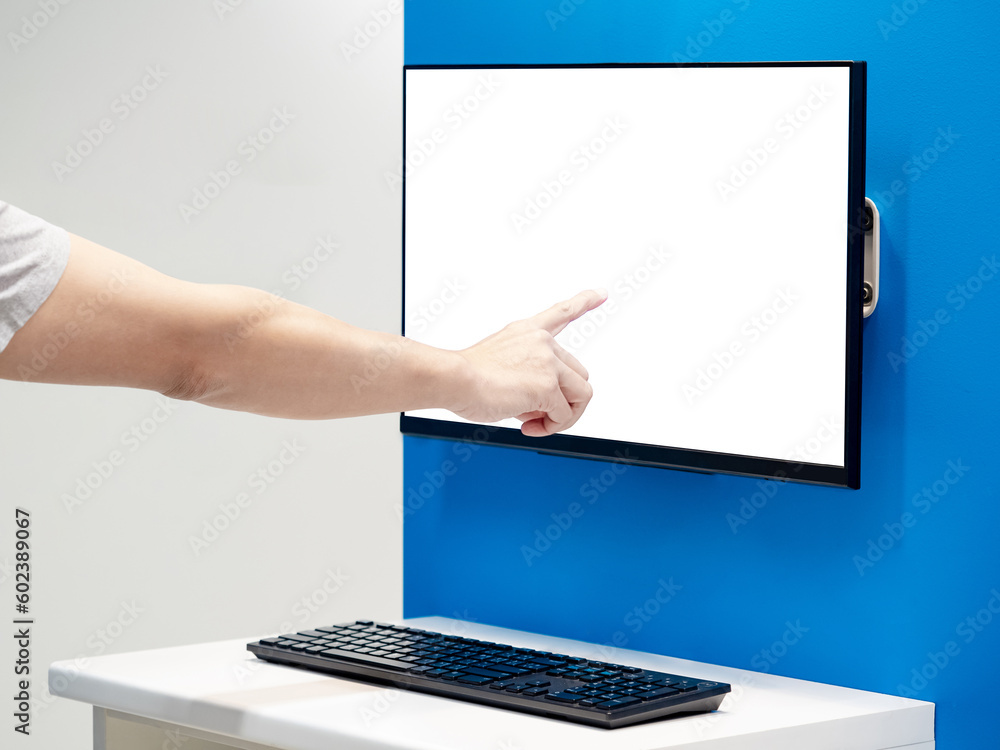 Using interactive touchscreen display in grocery store. Male customer ...