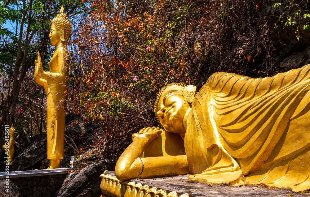 Large reclining gold Buddha statue at Wat Phousi in Luang Prabang Laos ...