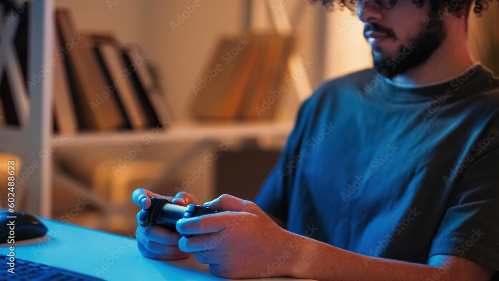 Gaming man. Cyber fun. Night entertainment. Unrecognizable casual guy ...