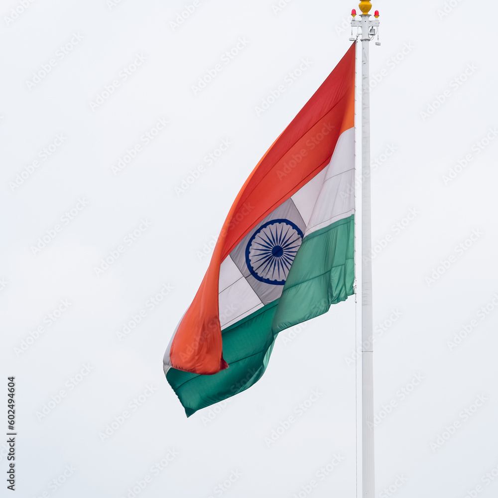 India flag flying high at Connaught Place with pride in blue sky, India ...