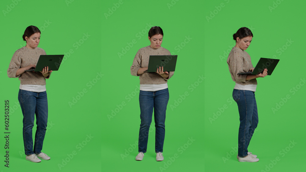 Caucasian woman browsing internet on laptop, holding wireless pc over ...