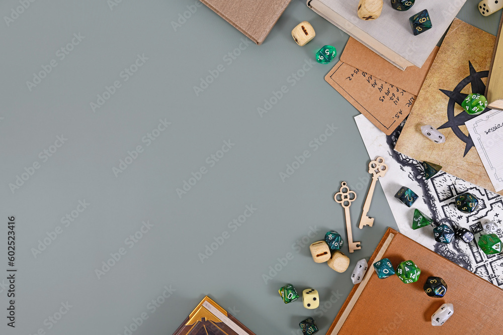 Tabletop role playing flat lay background with RPG dices, rule books ...