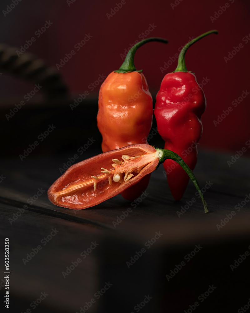 Pimenta leopard red pepper. Hot Italian peppers and half pepper cutaway ...