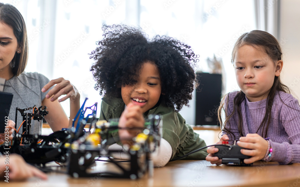 Portrait happy teacher help school children student having fun activity ...