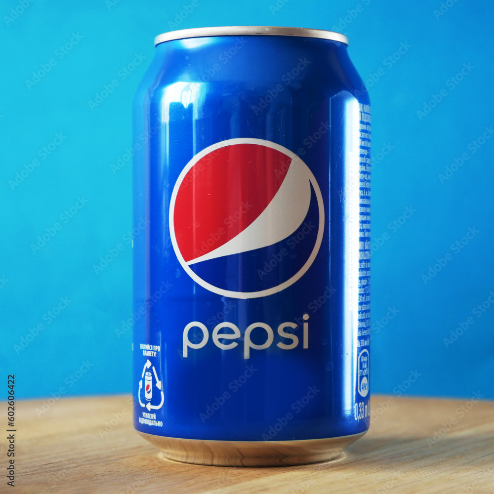 Kiev, Ukraine - May 12 2023: Pepsi Cola softdrink can on blue ...