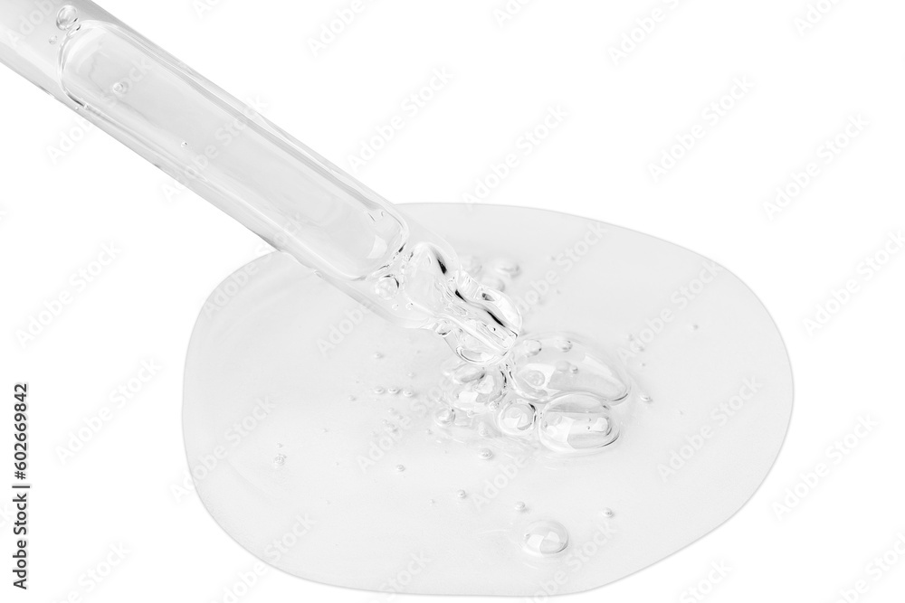 A flowing transparent gel from an eyedropper. Large droplet with ...