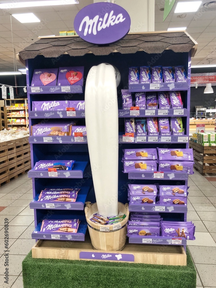 28.04.2023, Ukraine, Kharkiv, Milka chocolate on store shelves. Many ...