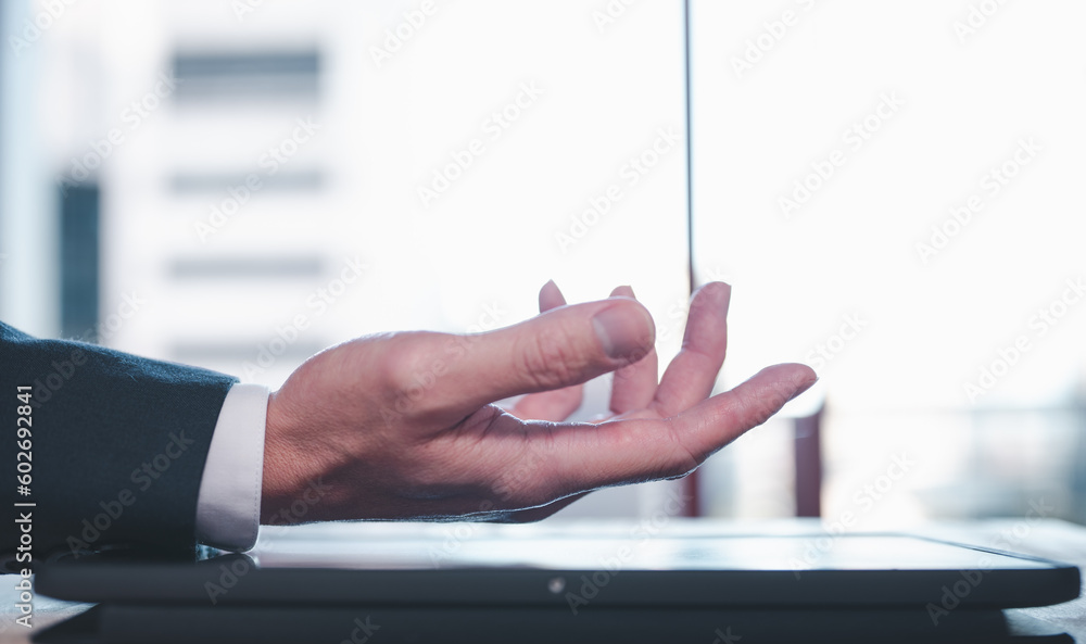 businessman putting hand on top of computer taplet screen with blurred ...